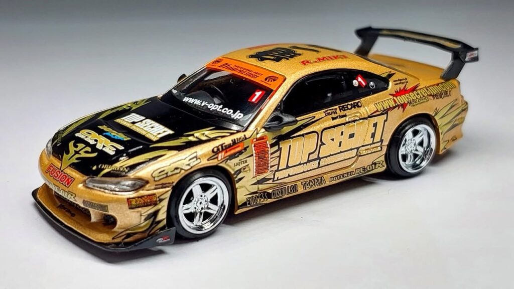 Mini GT 1:64 Nissan Silvia (S15) Top Secret D1GP- Gold | HW Bogotá